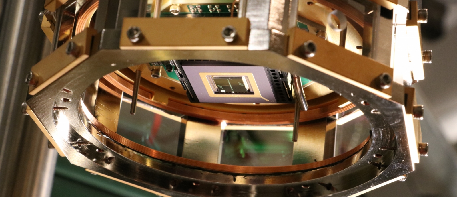 A new trapped-ion pair may help scale up quantum computers | MIT ...